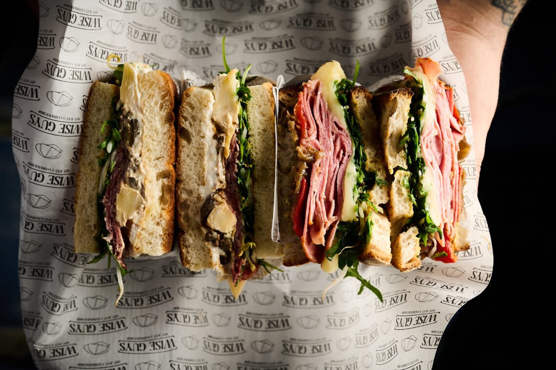 Experience the Flavors and Mystery of Wise Guys: Visit Now! - ICONIC ...